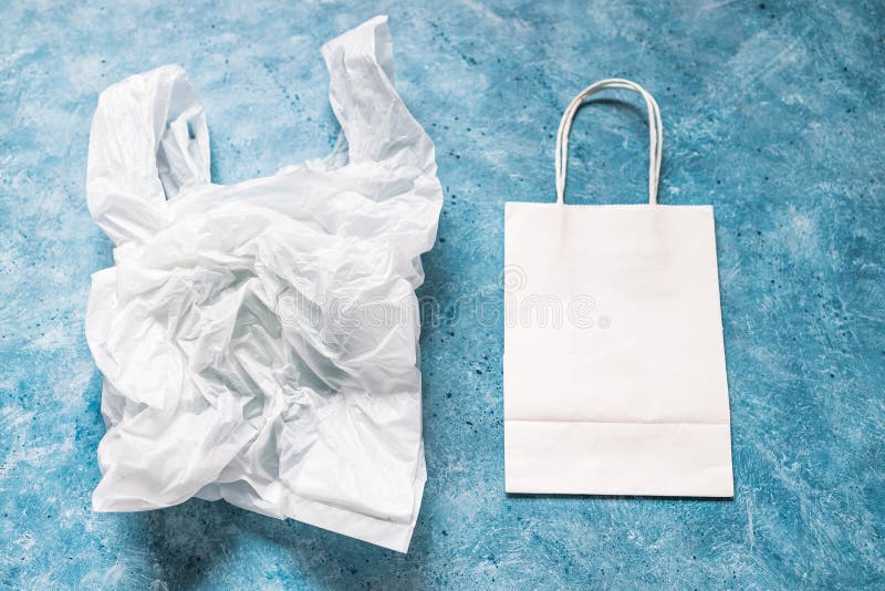 Single Use Plastic Bag Next To Paper One, Plastic Pollution and ...