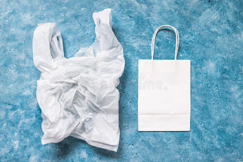 Single Use Plastic Bag Next To Paper One, Plastic Pollution and ...