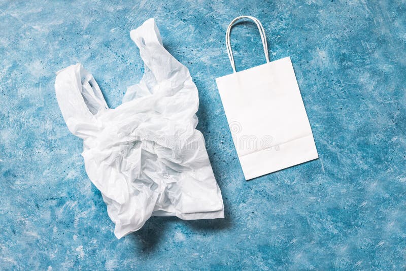 Single Use Plastic Bag Next To Paper One, Plastic Pollution and ...