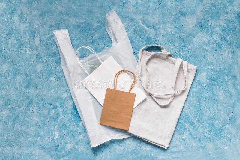 Single Use Plastic Bag Next To Paper and Reusable Canvas Ones, Plastic ...