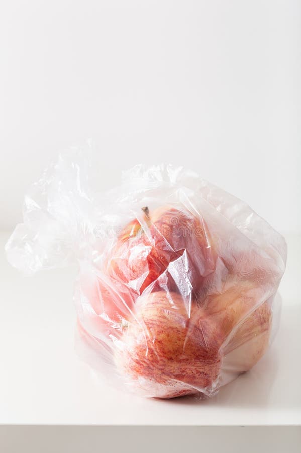 Single Use Plastic Packaging Issue. Apples in Plastic Bag Stock Image ...