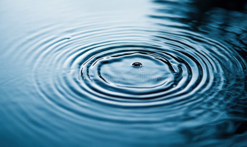 A Single Water Drop Creates Mesmerizing Concentric Circles As it ...
