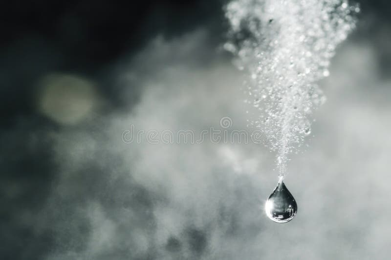 A Single Water Droplet Falls from a Pipe, Great for Use in ...