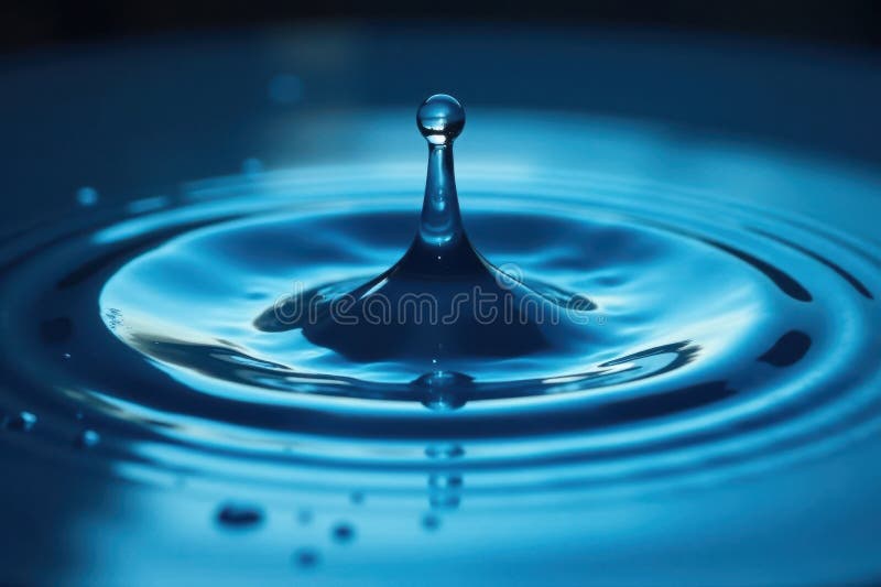 Single Water Droplet Impact, Creating Perfect Blue Circular Ripples ...