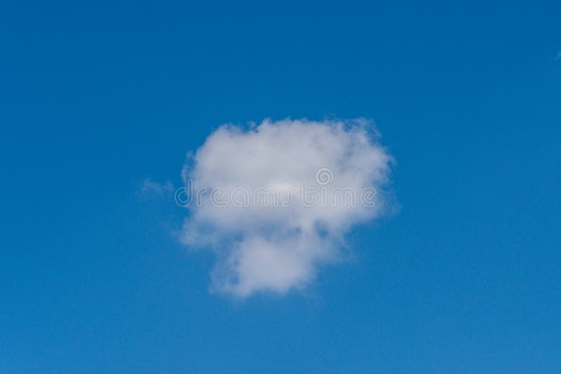 A Single Cloud in a Blue Sky Stock Image - Image of clear, flying ...