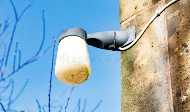 Single White Light on Stone Wall Stock Photo - Image of street ...