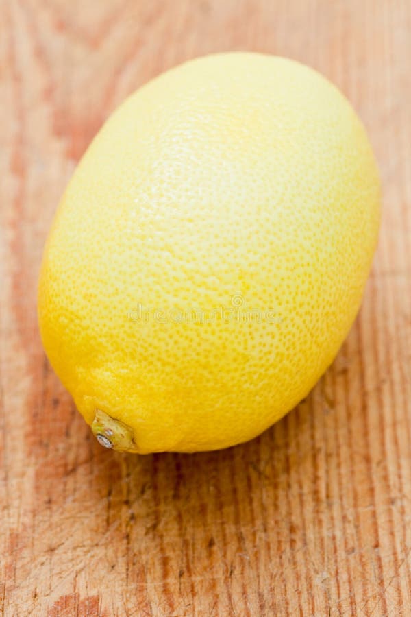 Single whole lemon stock image. Image of yellow, fruit - 13333959
