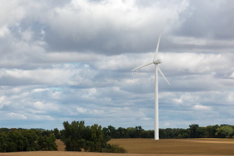 Single Wind Turbine in Green Field Against Dramatic Cloudy Sky, France ...