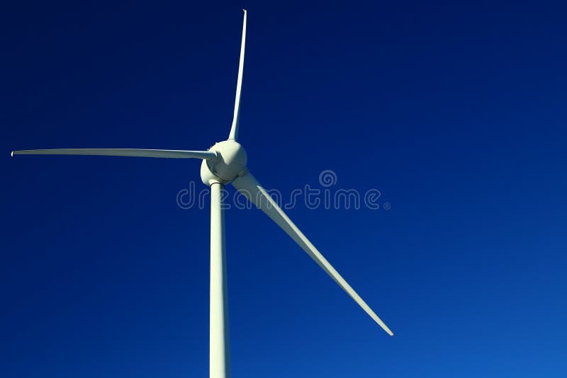 Single Wind Turbine on Dark Blue Sky Stock Photo - Image of single ...