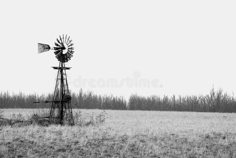 Single Windmill Standing in an Open Field Stock Photo - Image of ...
