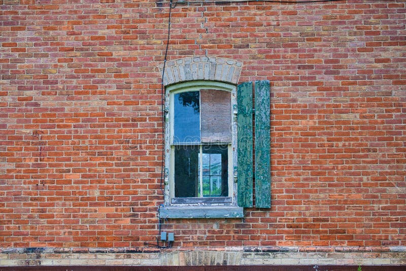 Old Brick Wall with Single Window and Green Shutter Stock Image - Image ...