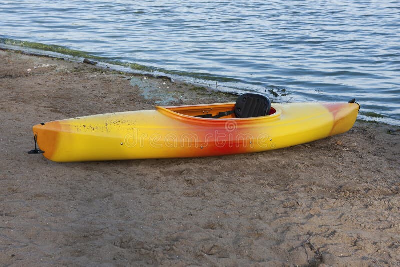 Single Yellow Kayak on the Beach Stock Photo - Image of maldives ...