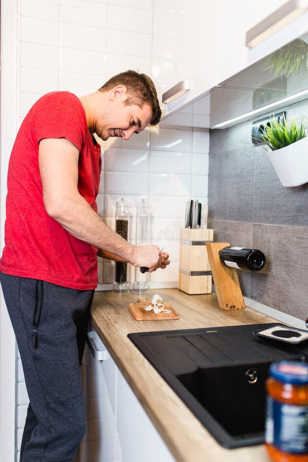 Man preparing dinner stock image. Image of gourmet, dieting - 122266021