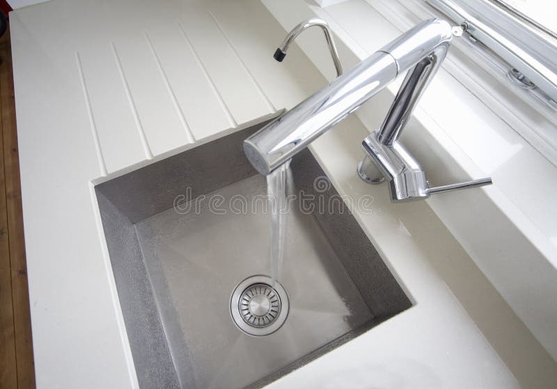 Kitchen Sink stock image. Image of elegance, home, flower - 28781773
