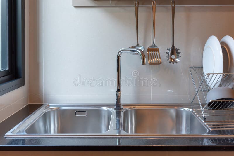 Sink with Faucet in Kitchen Stock Photo - Image of ceramic, plant ...