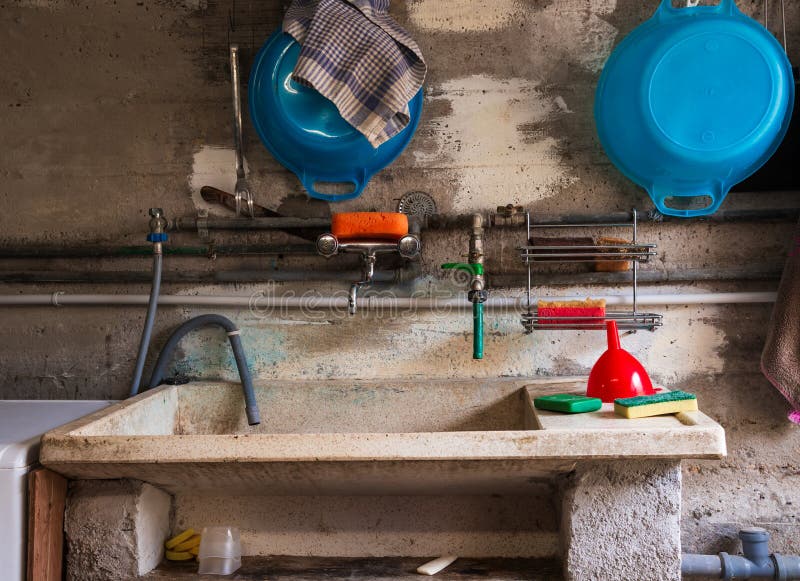 Sink in an Old Rustic Cement Wall Basement Stock Image - Image of ...