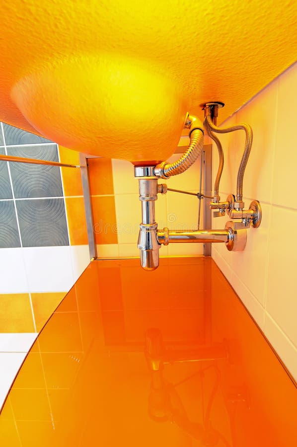 Modern orange sink stock photo. Image of drop, apartment - 8088080