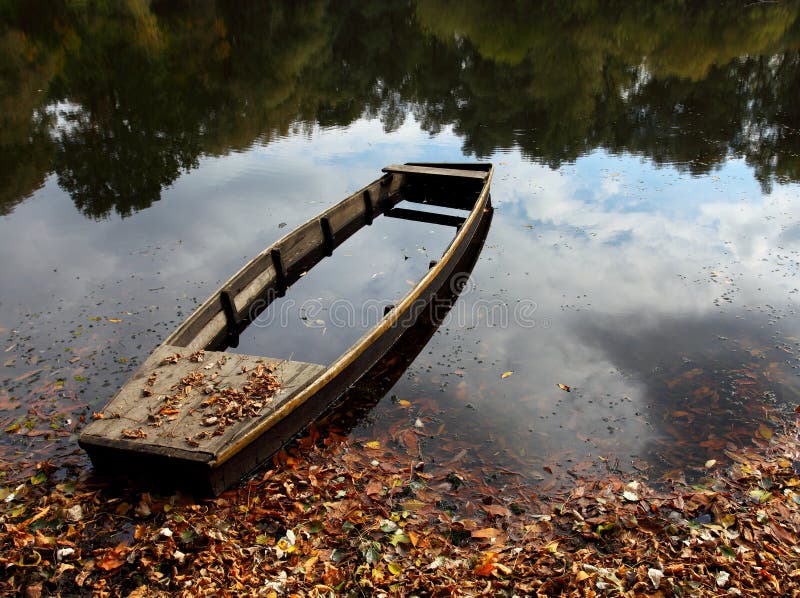Sinking boat on lake stock photo. Image of sinking, autumn - 80339290