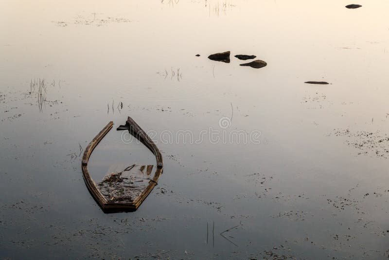 Sinking Boat in Lake at Sunrise Stock Photo - Image of nature, travel ...