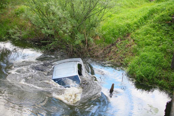 Sinking car stock image. Image of stream, street, transportation - 31160299