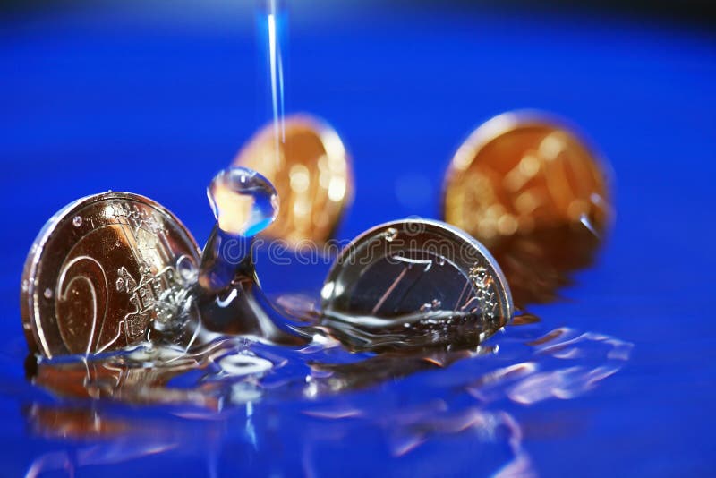 Sinking Coins stock photo. Image of conceptual, money - 35481192