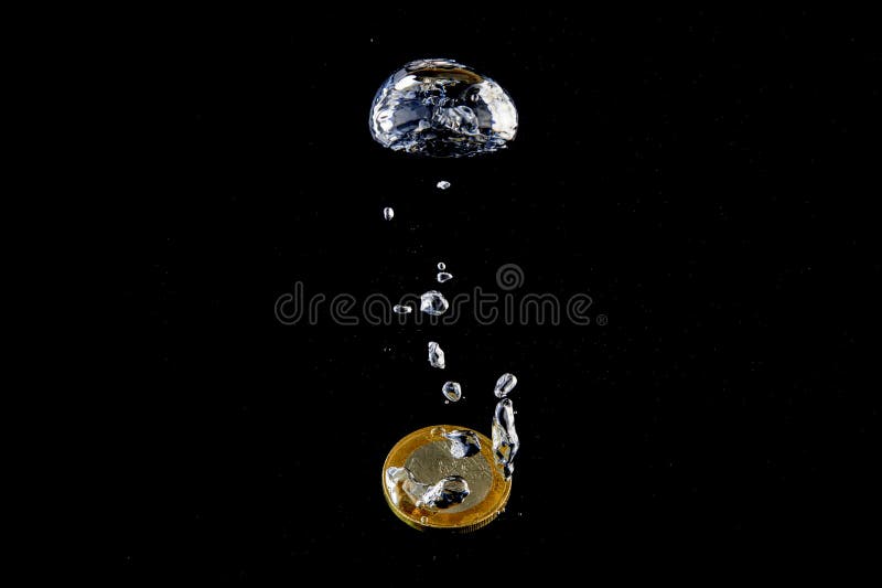 Sinking Euro. Splash of Coins Falling into the Water. Coins in the ...