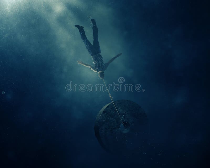 Sinking with a millstone. stock image. Image of millstone - 48608355