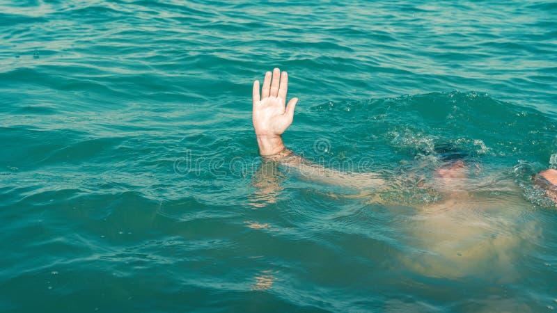 A Sinking Person, the Salvation of a Drowning Man Stock Photo - Image ...