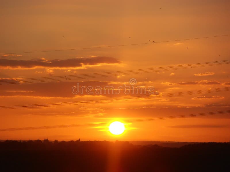 Sinking Sun with an Orange Sky Stock Image - Image of countryside ...
