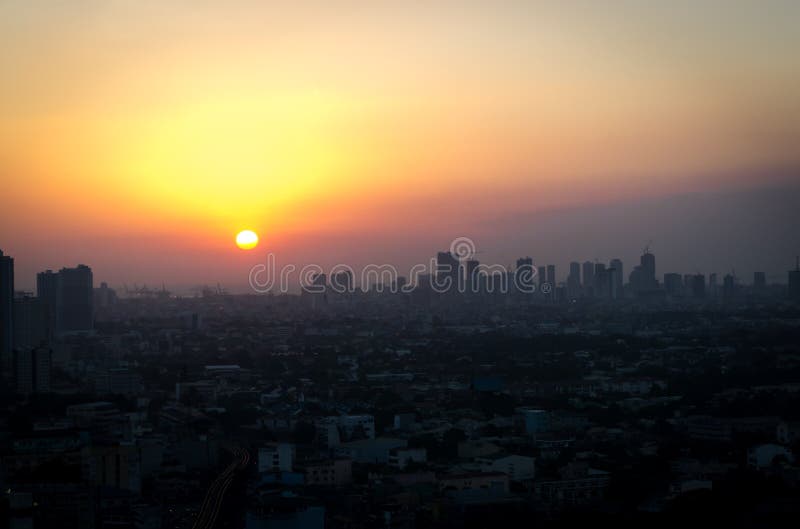 Sinking sun stock photo. Image of building, sinking, sunset - 66024306