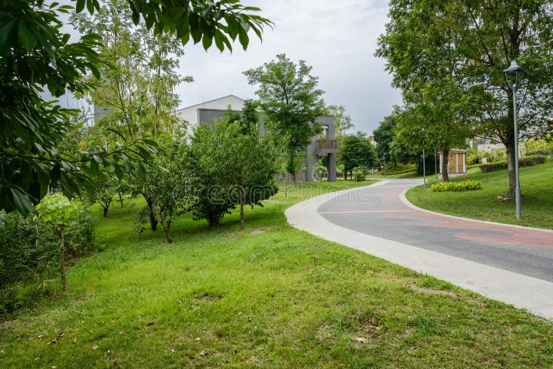 Sinuous Path in Lawn on Slope before Building in Cloudy Summer a Stock ...