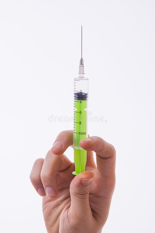 Siringa fotografia stock. Immagine di tenuta, iniezione - 51619760