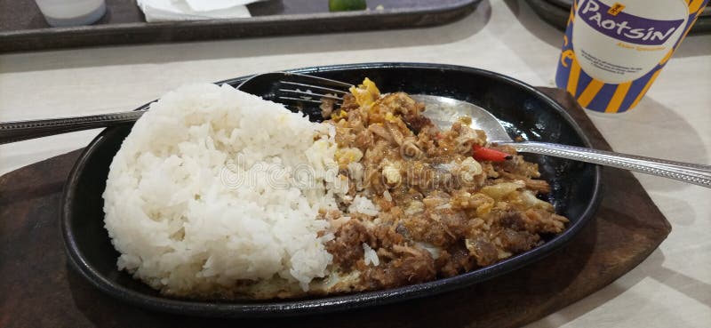 Sisig with rice in Paotsin editorial stock photo. Image of dessert ...