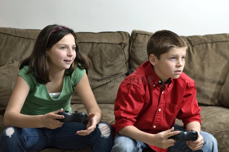 Sister and Brother Playing a Video Game Stock Image - Image of ...