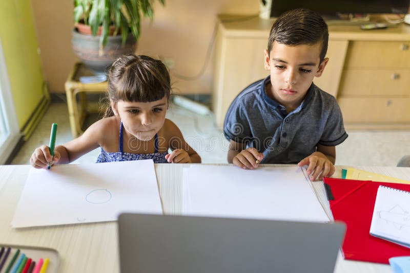 Sister and Brother Taking Online Classes at Home Stock Image - Image of ...