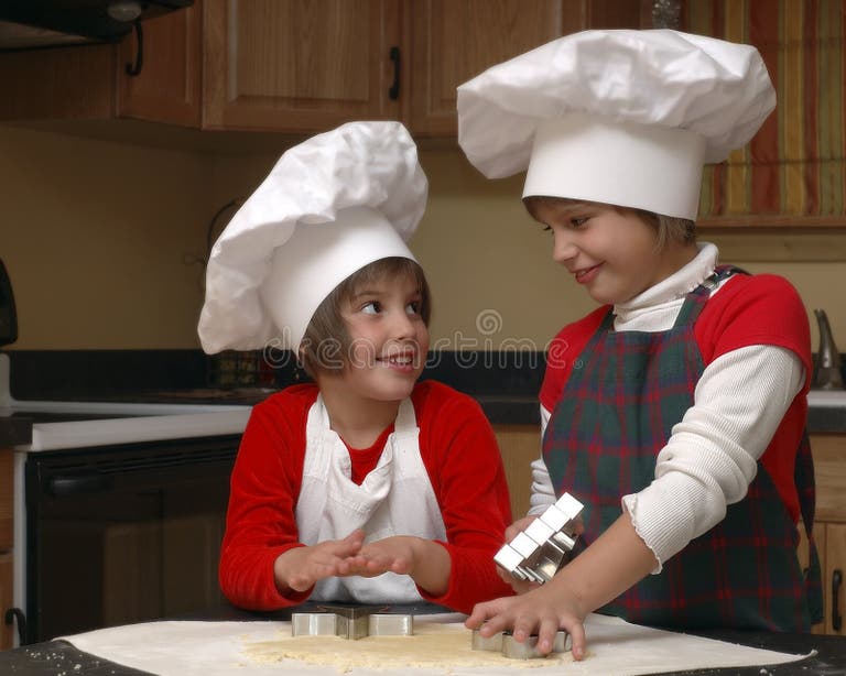 Sister chefs stock image. Image of cutter, child, daughters - 1519511