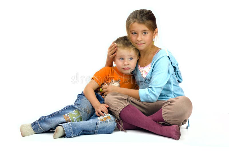 Sister helps her brother stock image. Image of intent - 3539295
