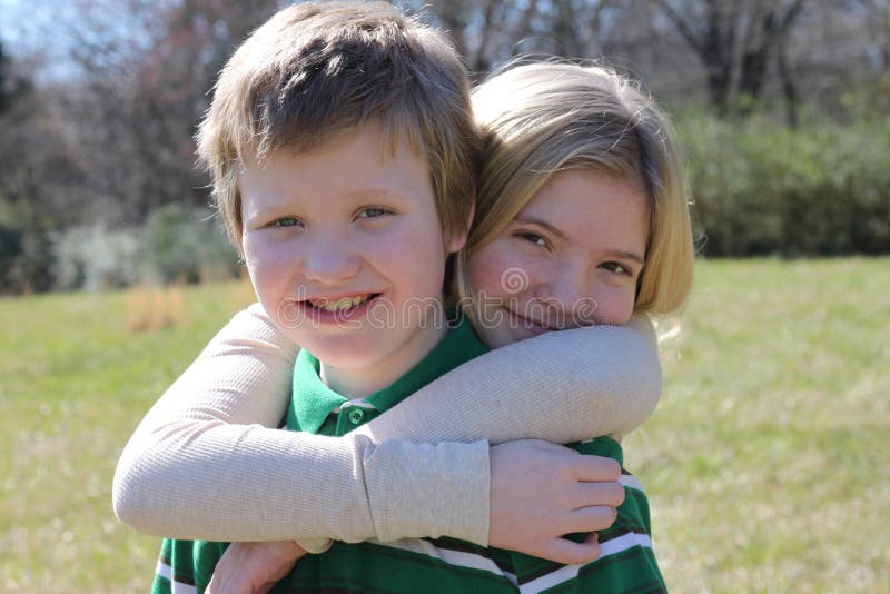 Sisterly Love stock image. Image of autism, field, outdoors - 23583907