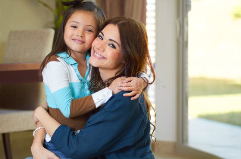 Sisterly Love. Two Sisters Hugging Each Other while Smiling. Stock ...