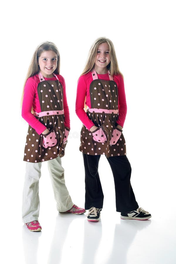 Sisters in aprons stock photo. Image of happy, polka - 11653882