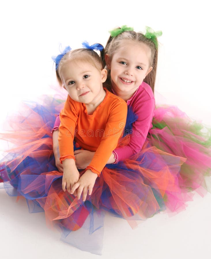 Sisters in Bright Tutu Skirts Stock Image - Image of costume, adorable ...