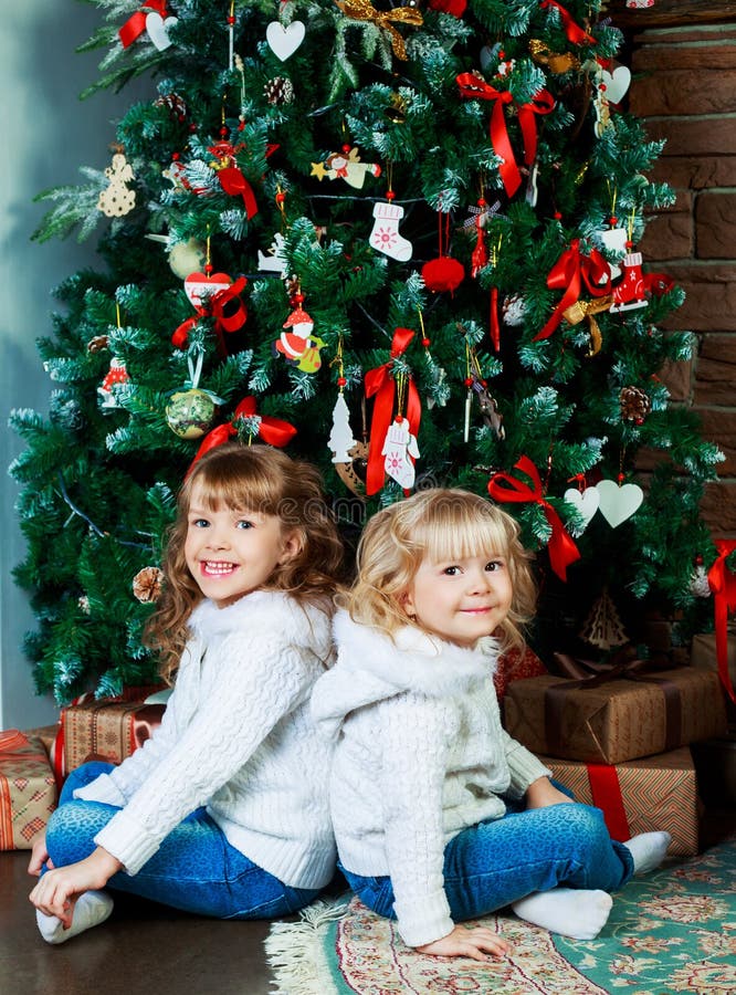 Sisters at home Christmas stock image. Image of family - 102788339