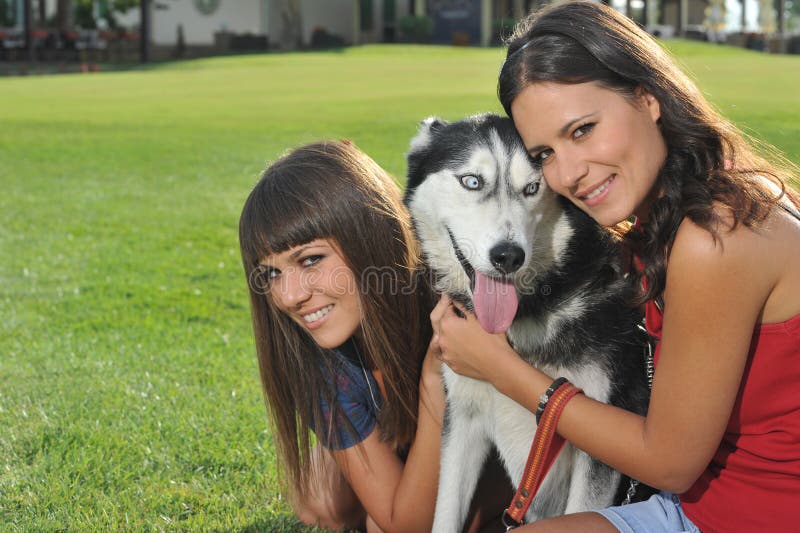 Sisters and husky stock photo. Image of season, love - 28840590