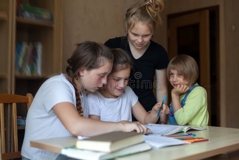 Sisters Learning Lessons at Home Stock Photo - Image of home, caucasian ...