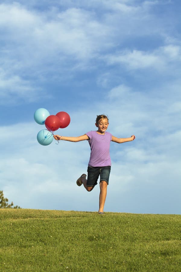 Sisters Running with Balloons Stock Photo - Image of hill, activity ...
