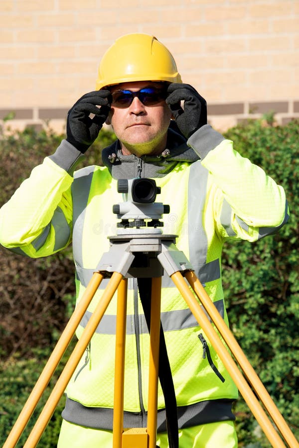 Site Engineer Checking Levels of the Road Using Autolevel Stock Photo ...