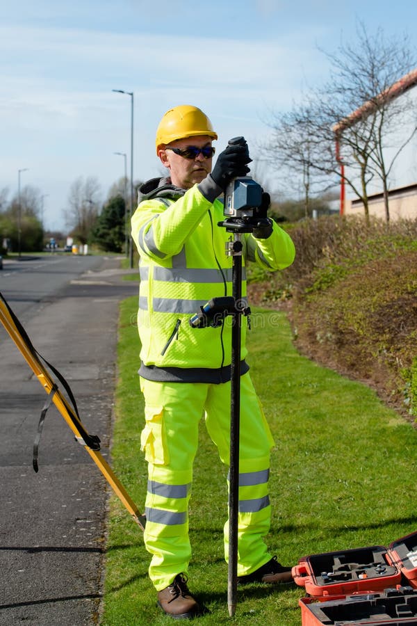 Site Engineer Checking Levels of Road Using Autolevel Stock Photo ...