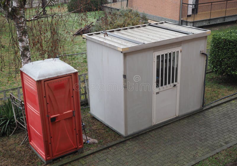 Site Hut and Chemical Toilet in a Construction Site Stock Photo - Image ...