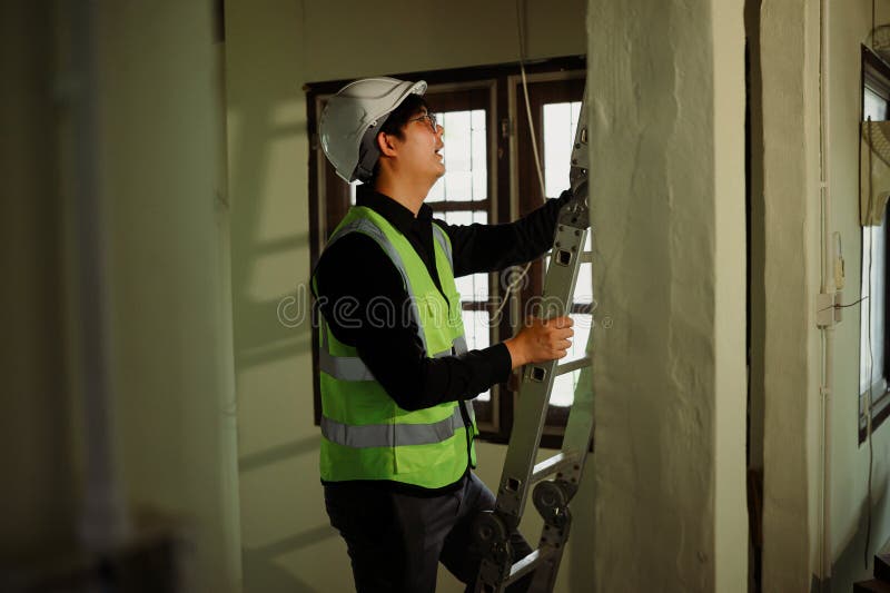 Site Inspector Climbing Ladder for Ceiling Inspection in Renovation ...