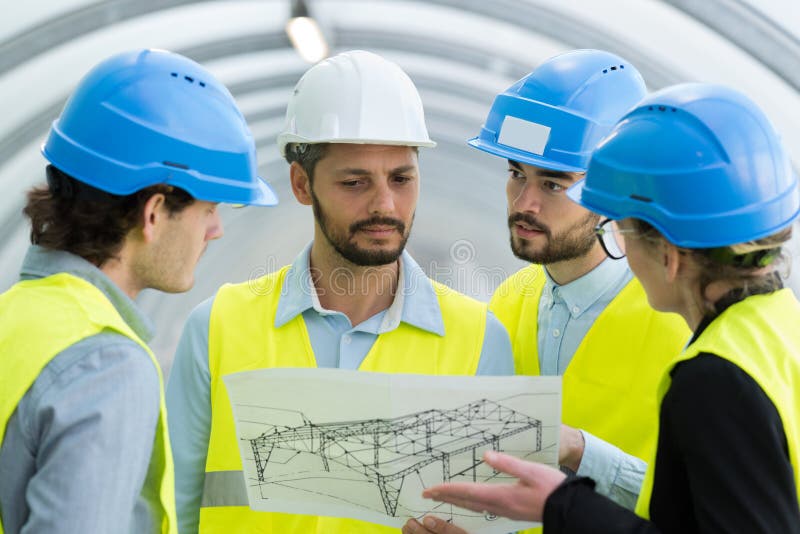 Site manager and team stock image. Image of discussing - 283609945